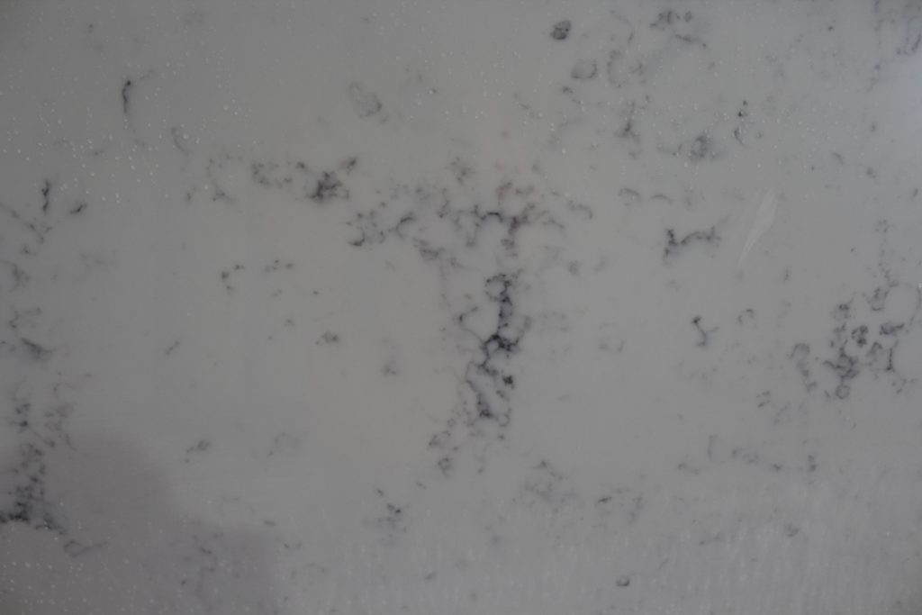 Venato Extra White (close-up) - Hands on Granite