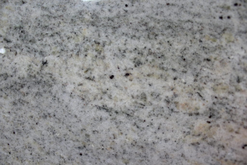 Millenium Cream (close-up) - Hands on Granite